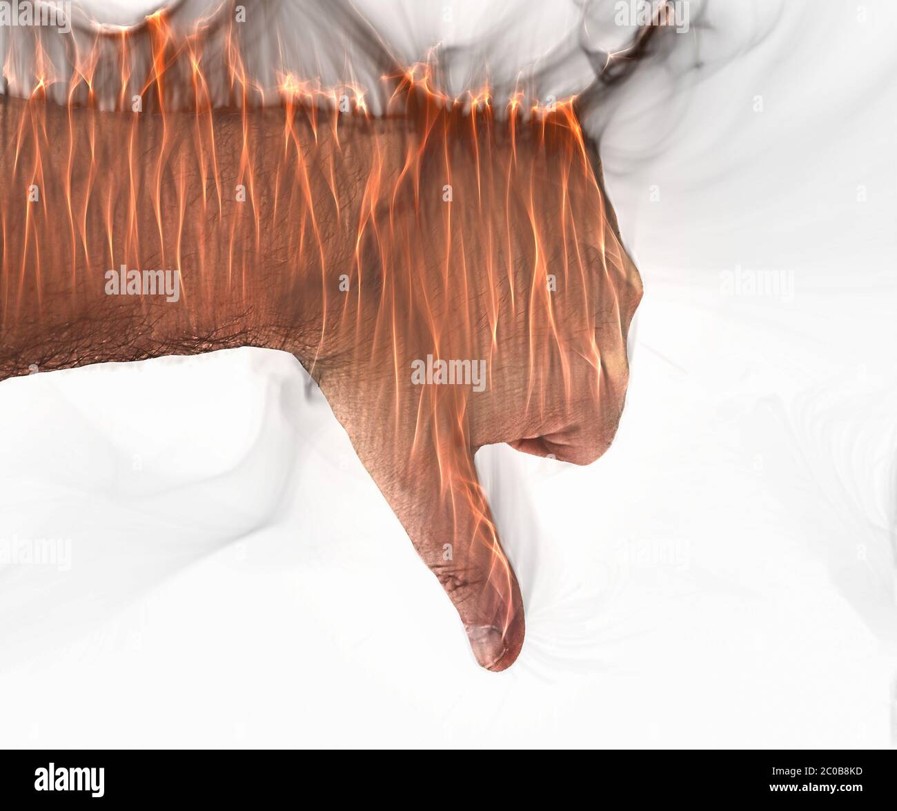 A human hand on fire burning with orange flames and some smoke in front ...