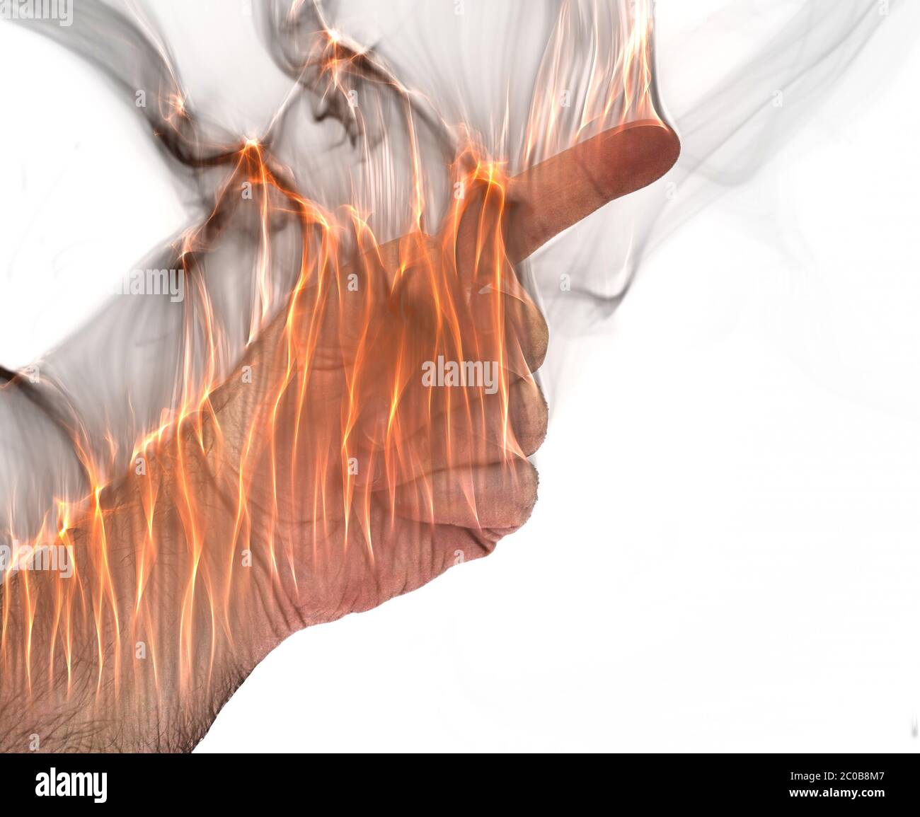 A human hand on fire burning with orange flames and some smoke in front ...