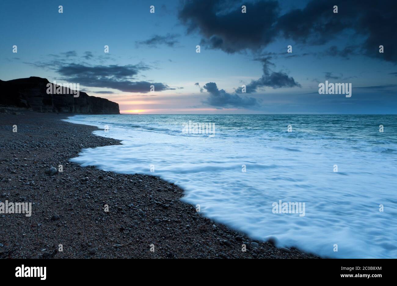 sunset on Atlantic ocean coast Stock Photo - Alamy