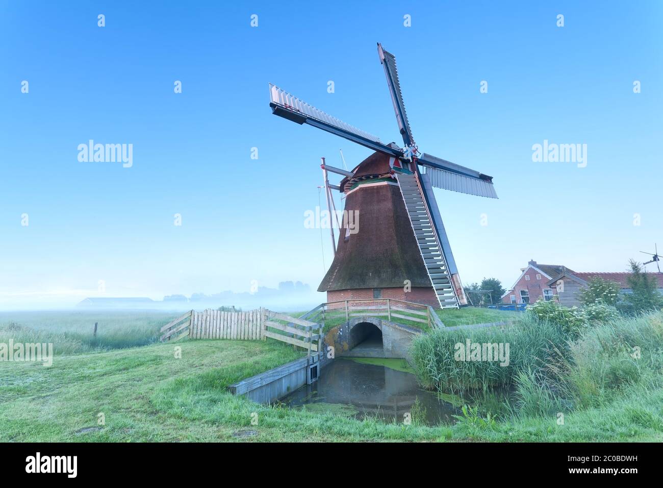 Dutch windmill in early hi-res stock photography and images - Alamy