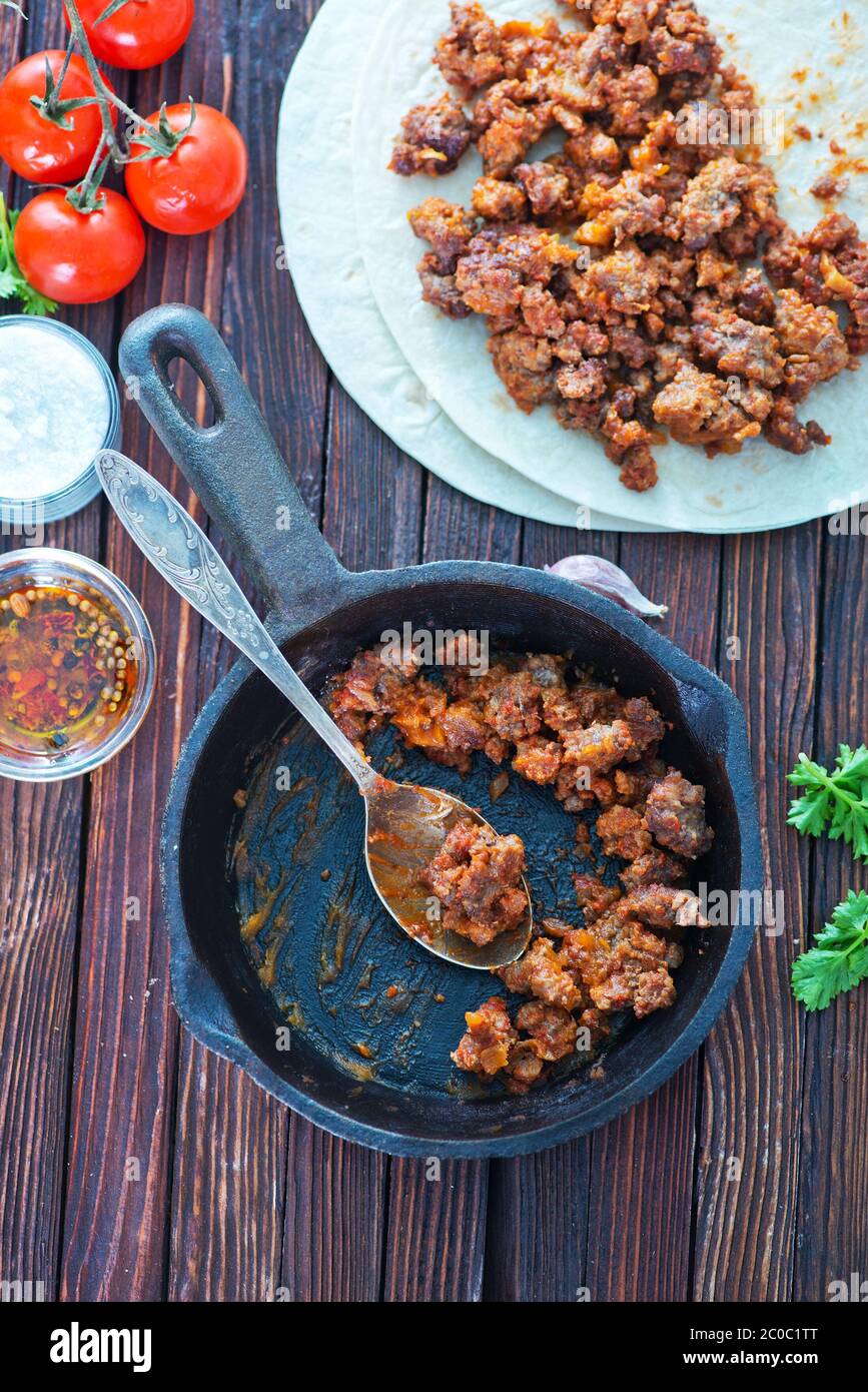 Sauteing meat hi-res stock photography and images - Alamy