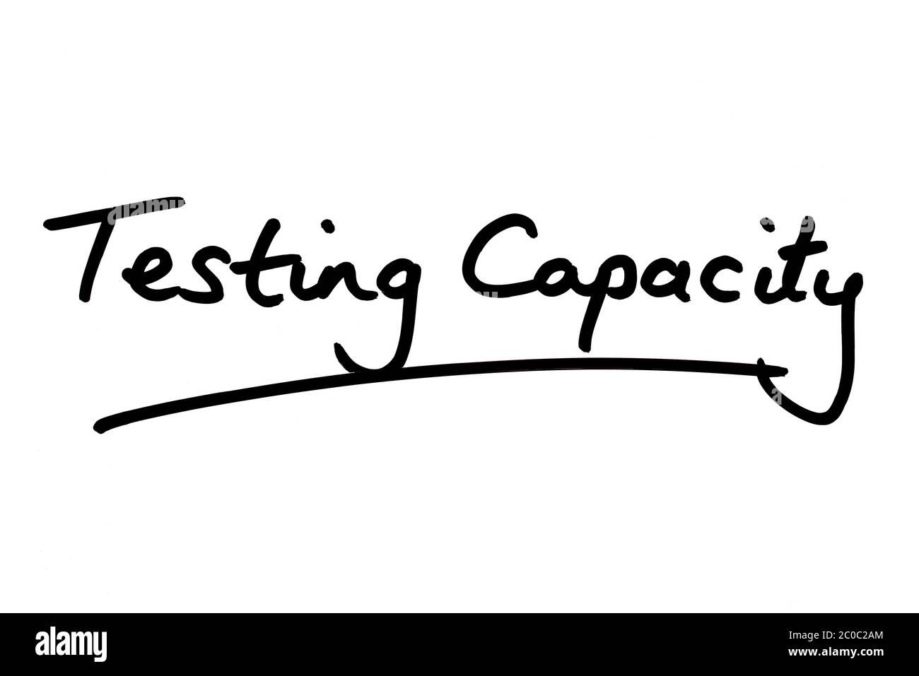 Testing Capacity handwritten on a white background Stock Photo - Alamy