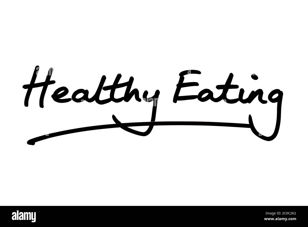 Healthy Eating handwritten on a white background Stock Photo - Alamy