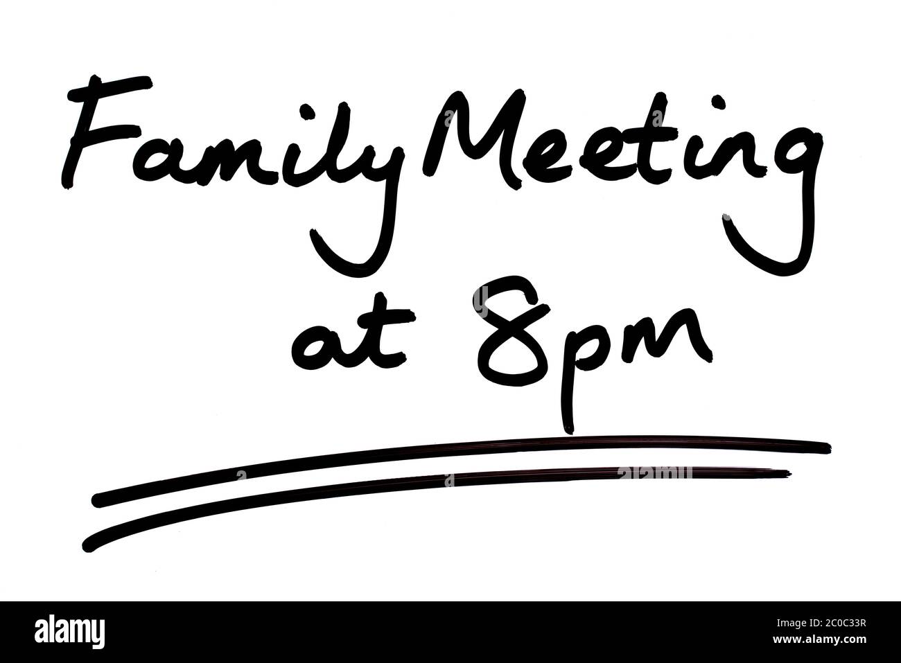 Family Meeting at 8pm handwritten on a white background Stock Photo - Alamy
