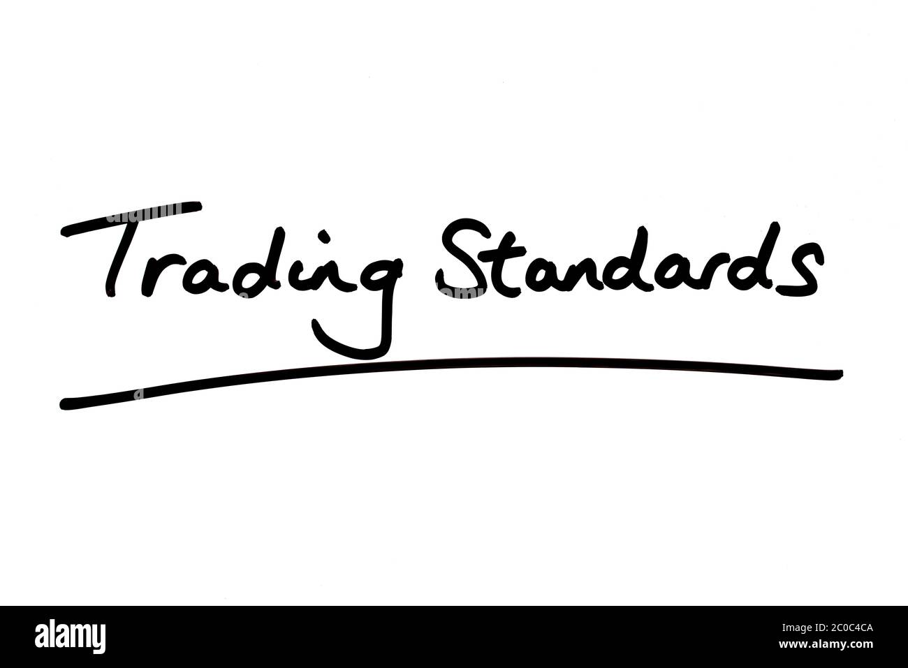 Trading Standards handwritten on a white background Stock Photo - Alamy