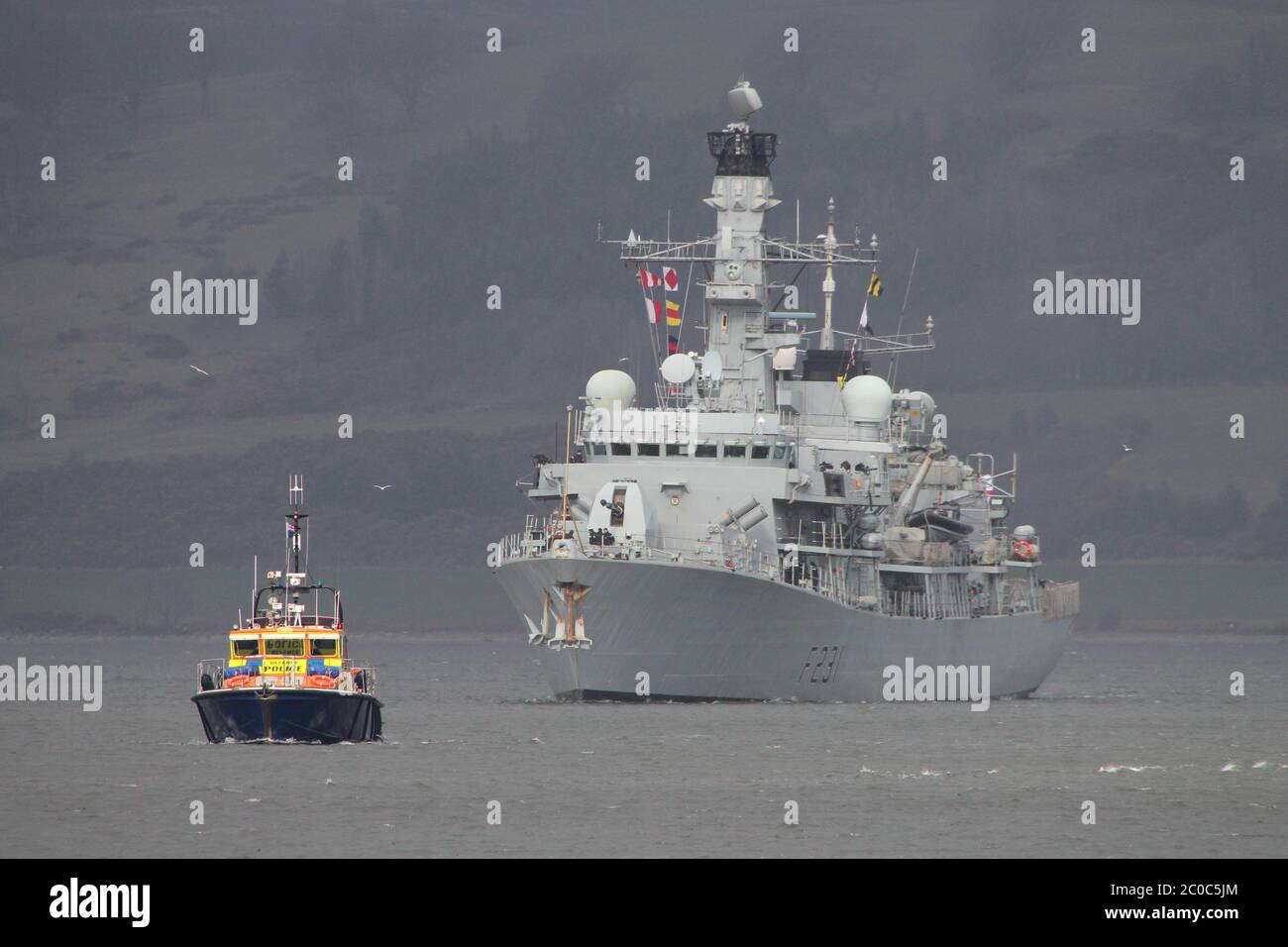 The Ministry of Defence Police boat MDP Condor, escorts the Royal Navy ...
