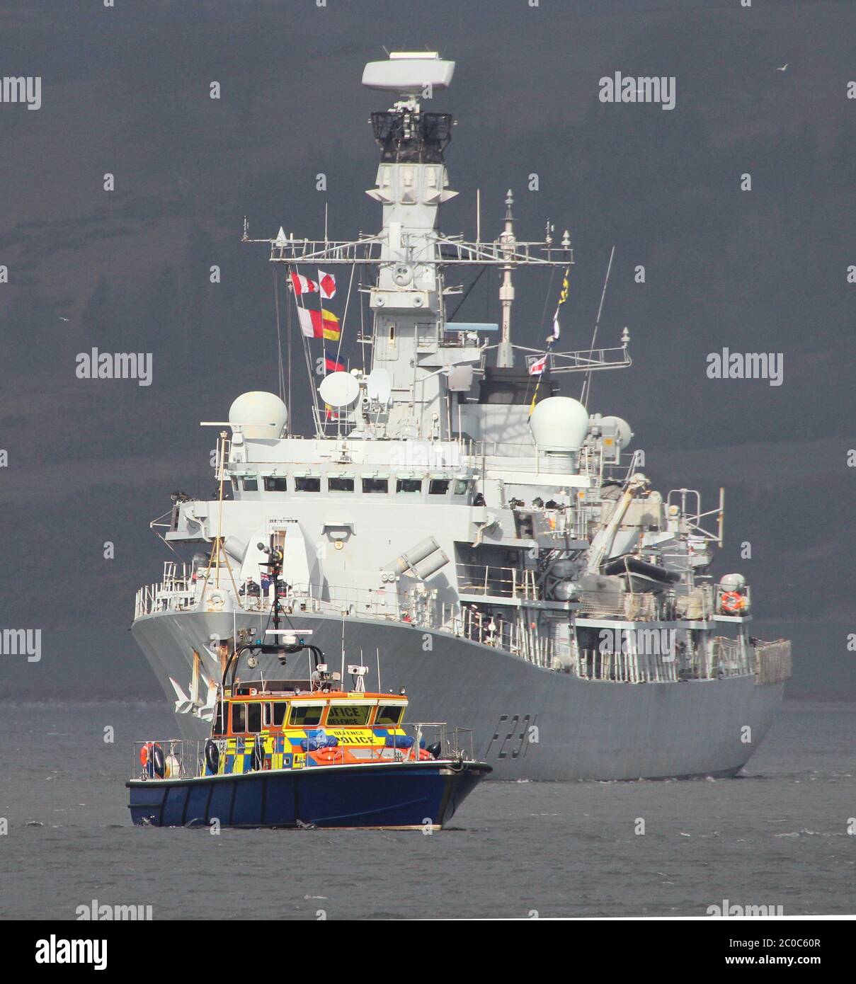 The Ministry of Defence Police boat MDP Condor, escorts the Royal Navy ...