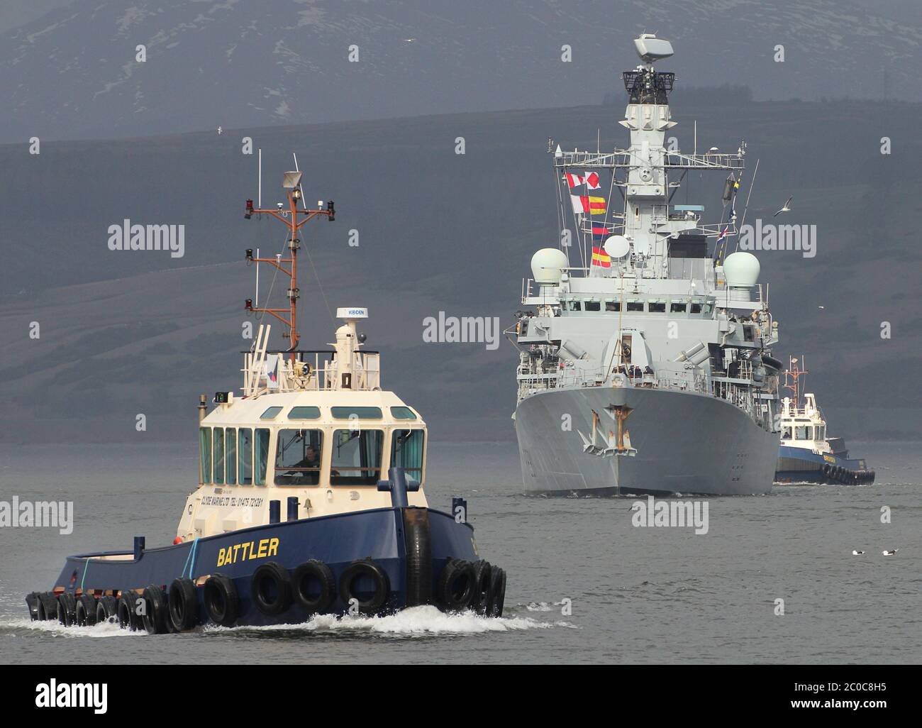 The Clyde Marine Services tug boats Battler and Bruiser, escorts the ...