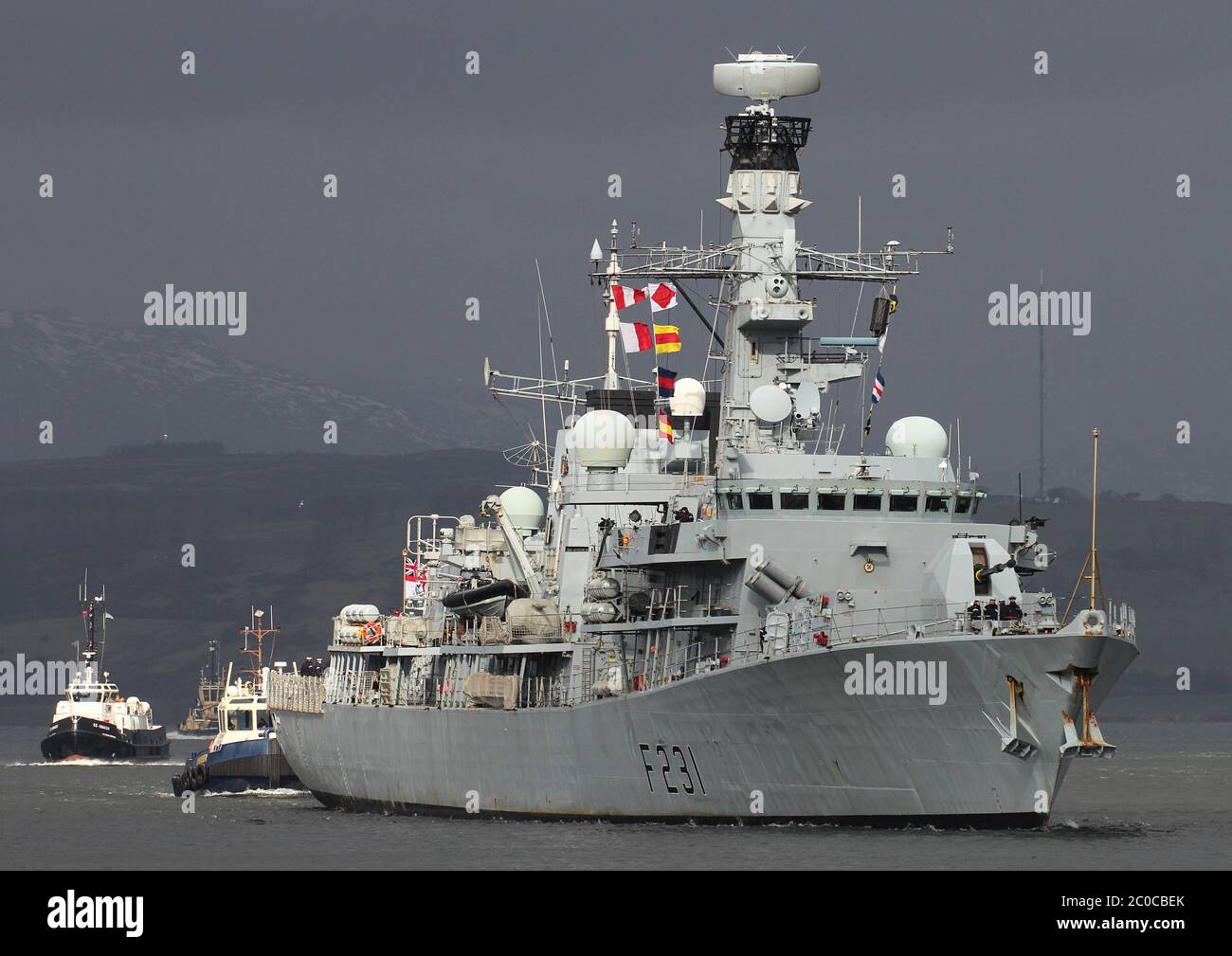 The Clyde Marine Services tug boat Bruiser, escorts the Royal Navy ...