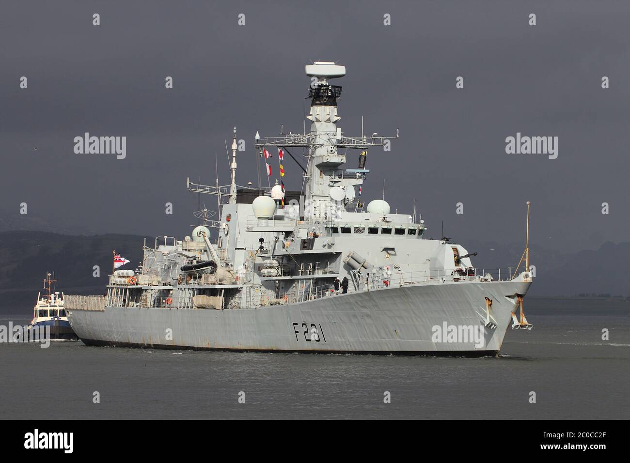 The Clyde Marine Services tug boat Bruiser, escorts the Royal Navy ...