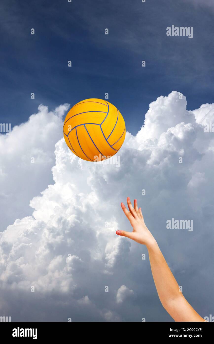 Hand and ball Stock Photo - Alamy