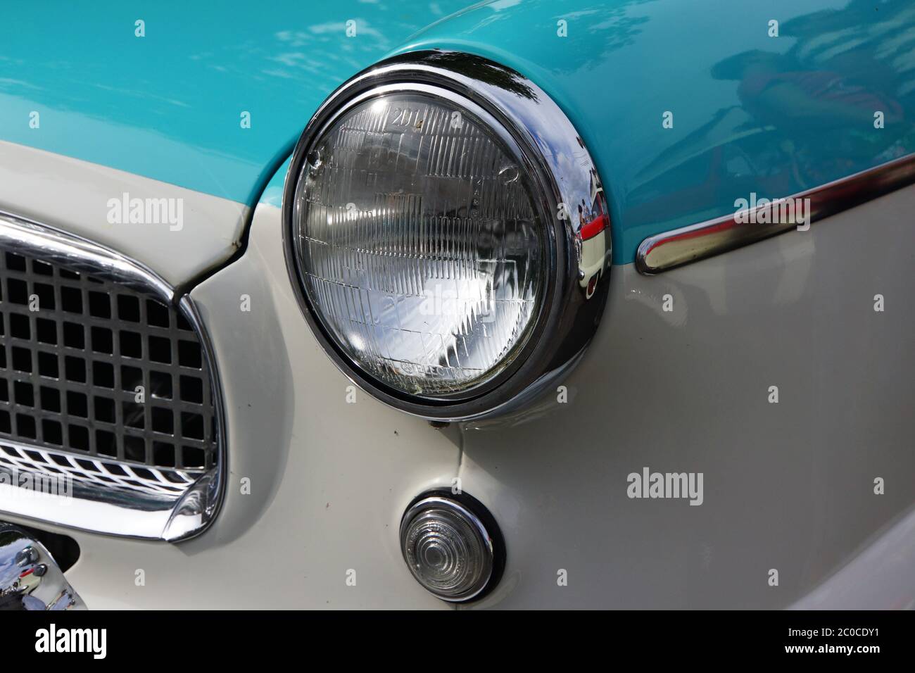 Headlight and radiator grille on a vintage car Stock Photo - Alamy