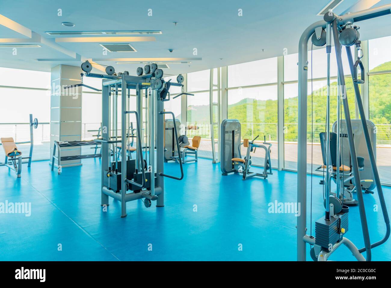 Modern gym with various sports equipment Stock Photo - Alamy