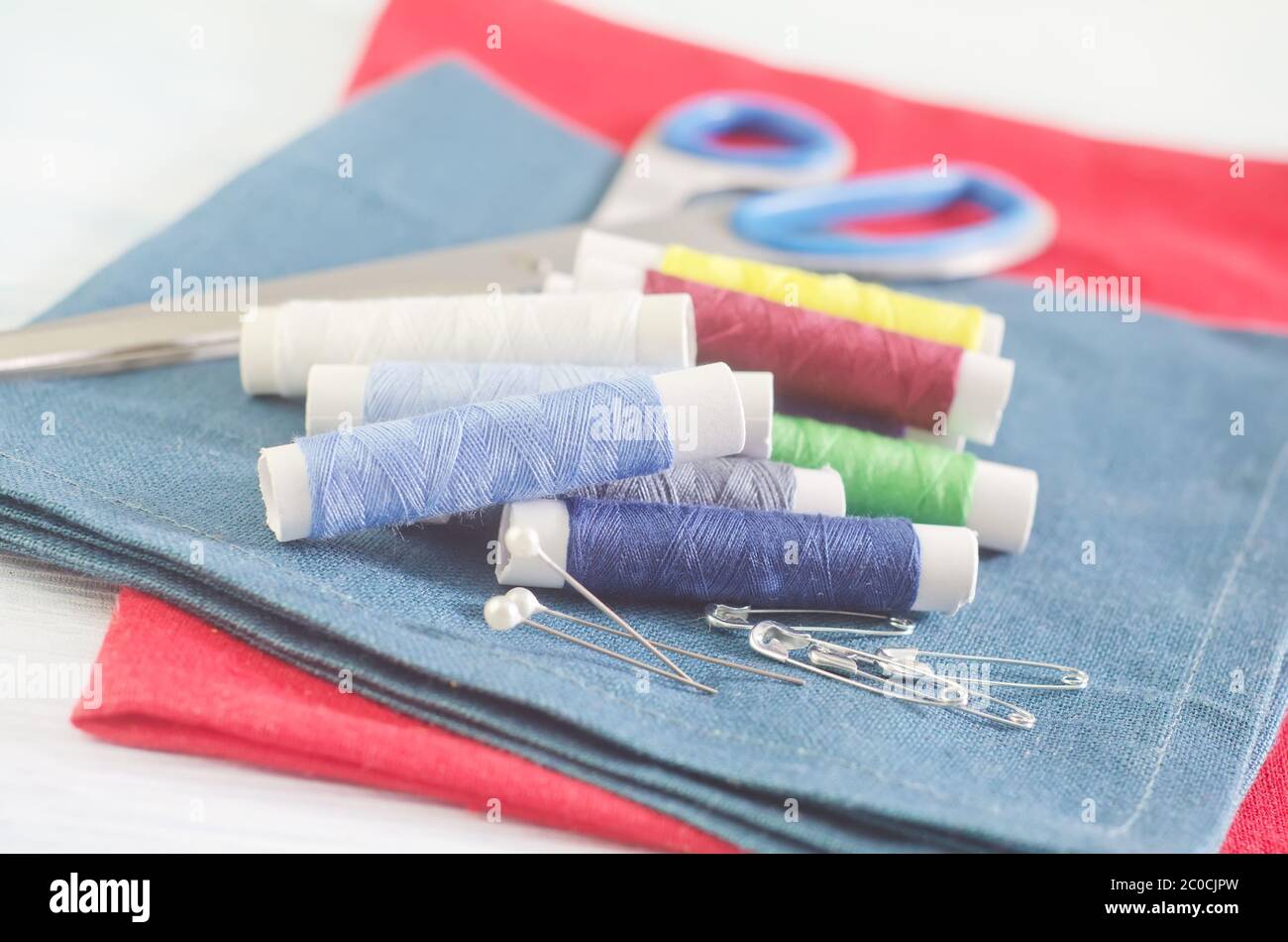 thread and scissors Stock Photo - Alamy