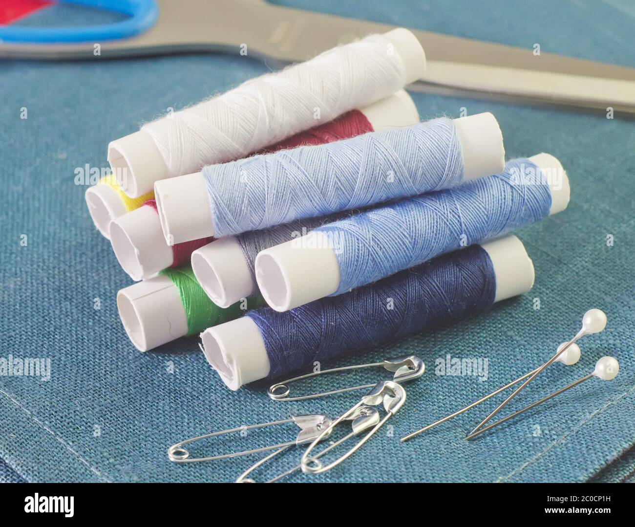 thread and scissors Stock Photo - Alamy