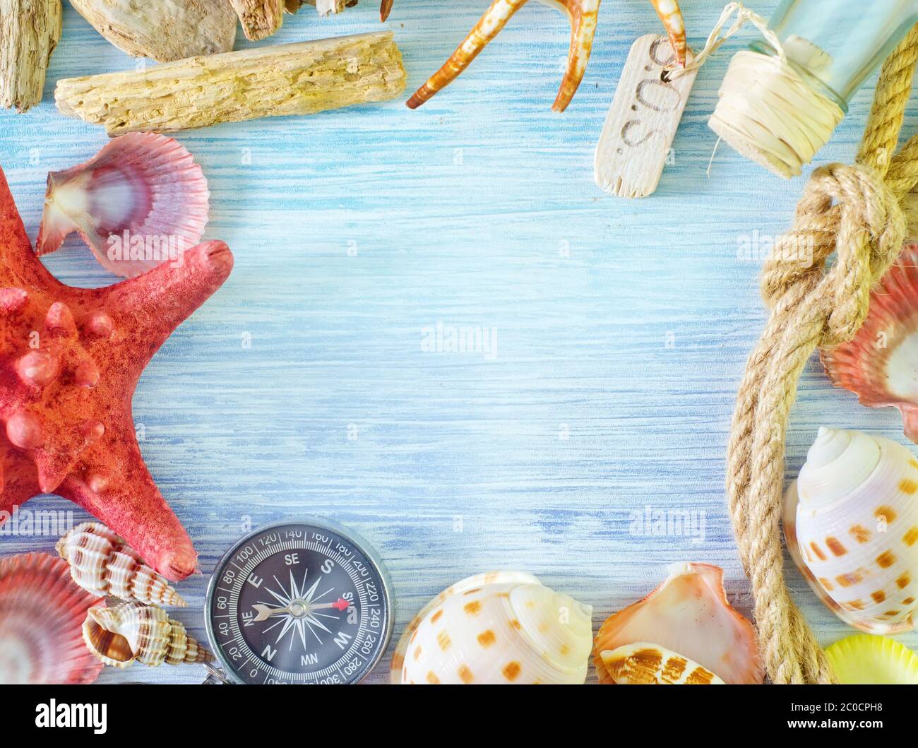 sea shells and compass Stock Photo - Alamy