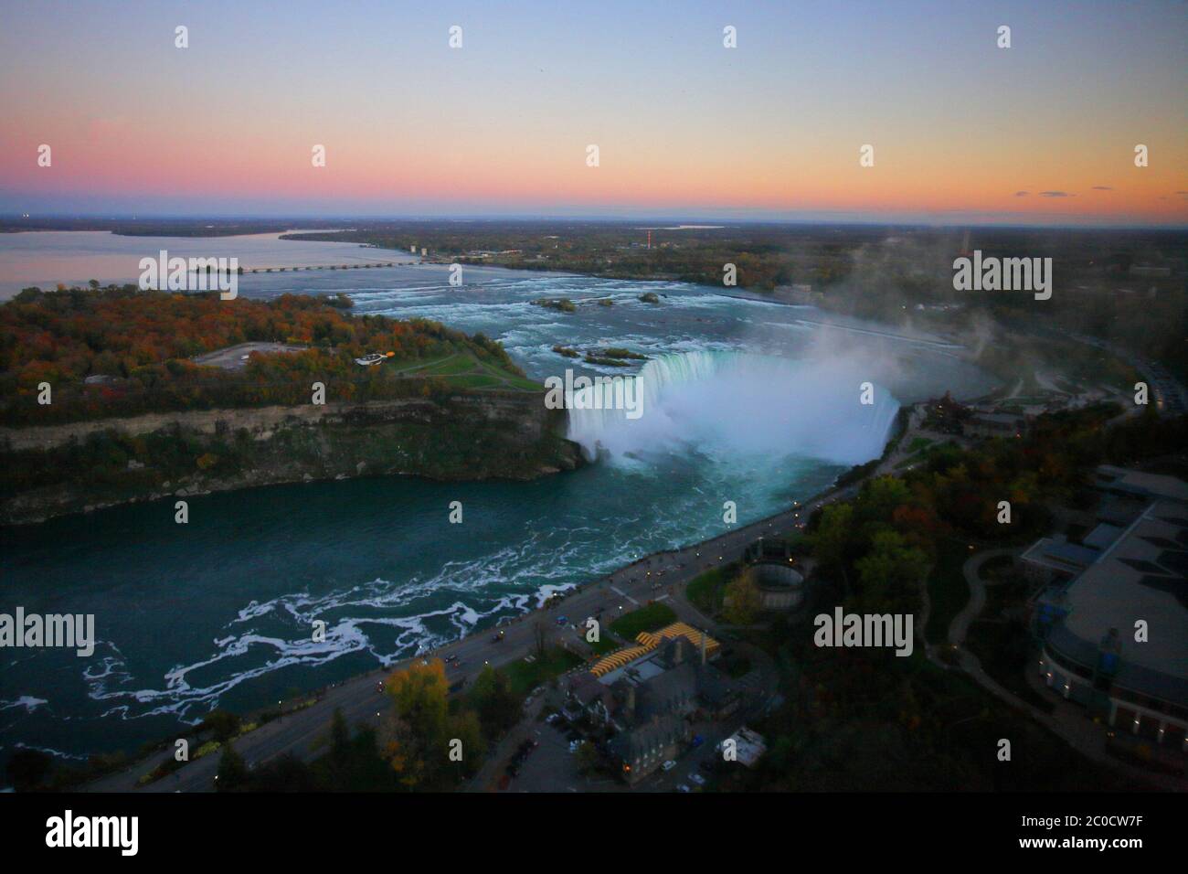 Aerial view of Niagara Falls at sunset, during autumn with colorful ...