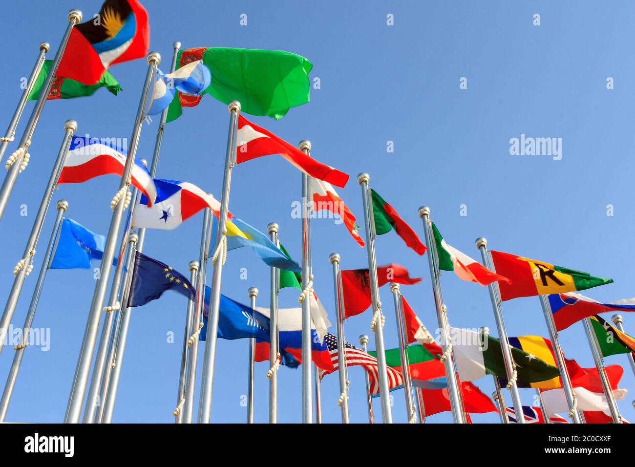 Different countries flags united together against blue sky Stock Photo ...
