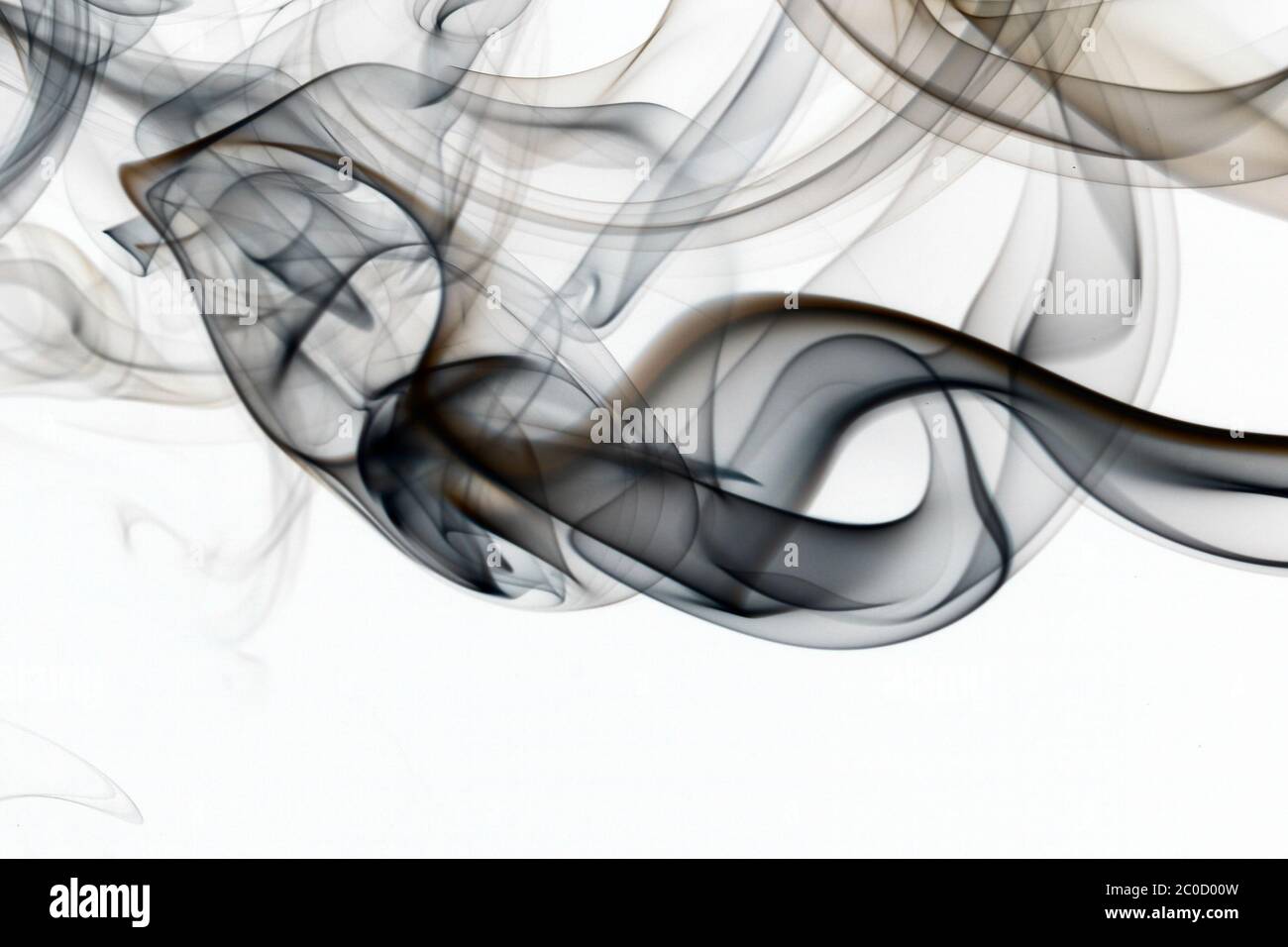 Beautiful smoke on the white background - macro photo Stock Photo - Alamy