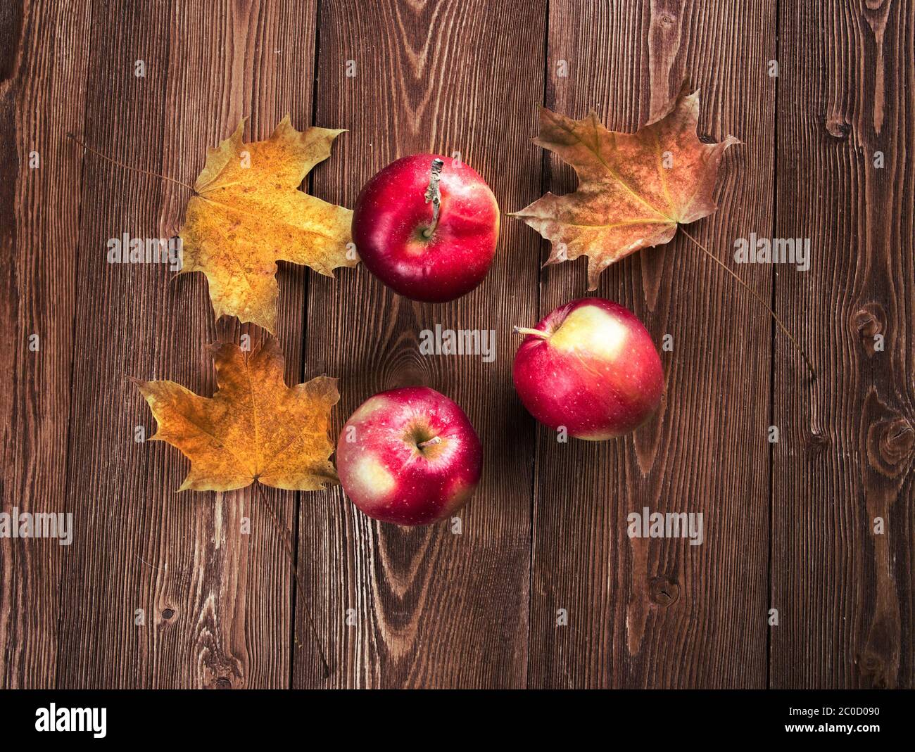 Autumn border from apples and fallen leaves Stock Photo - Alamy