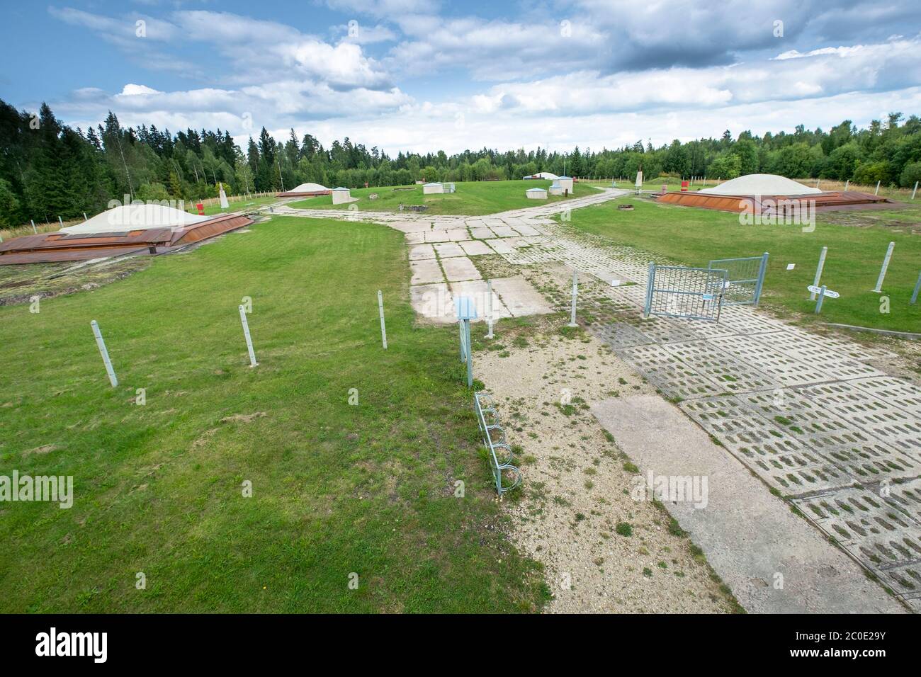 An overivew of the four missile silo caps in a field. At the Cold War ...