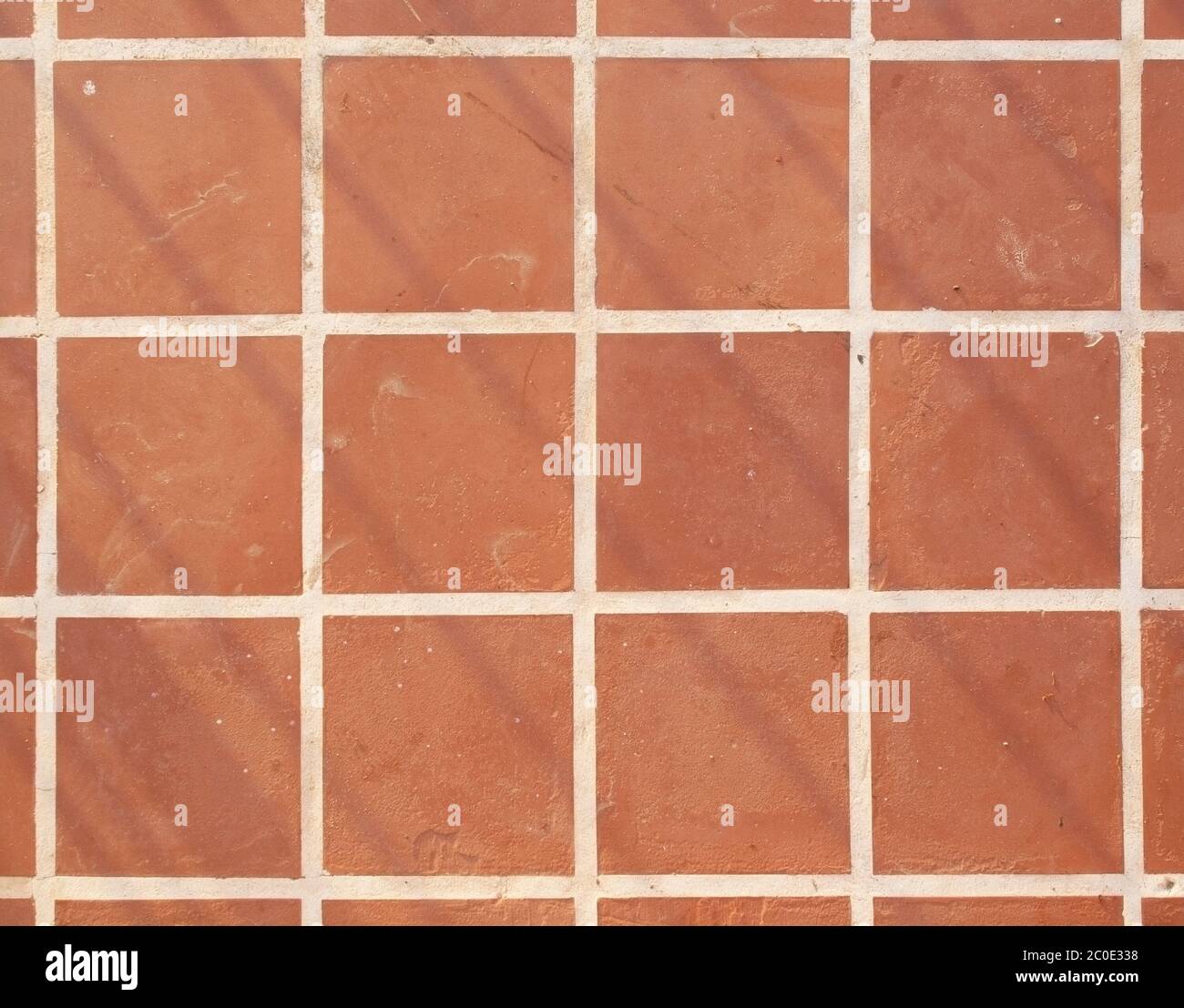 Terracotta floor square tile background texture Stock Photo - Alamy