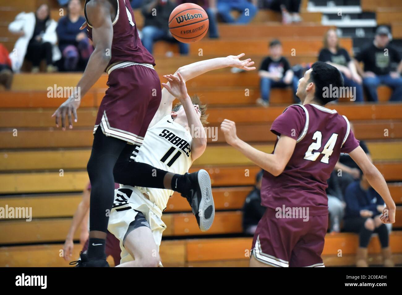 Player reeling after being separated from the basketball following ...
