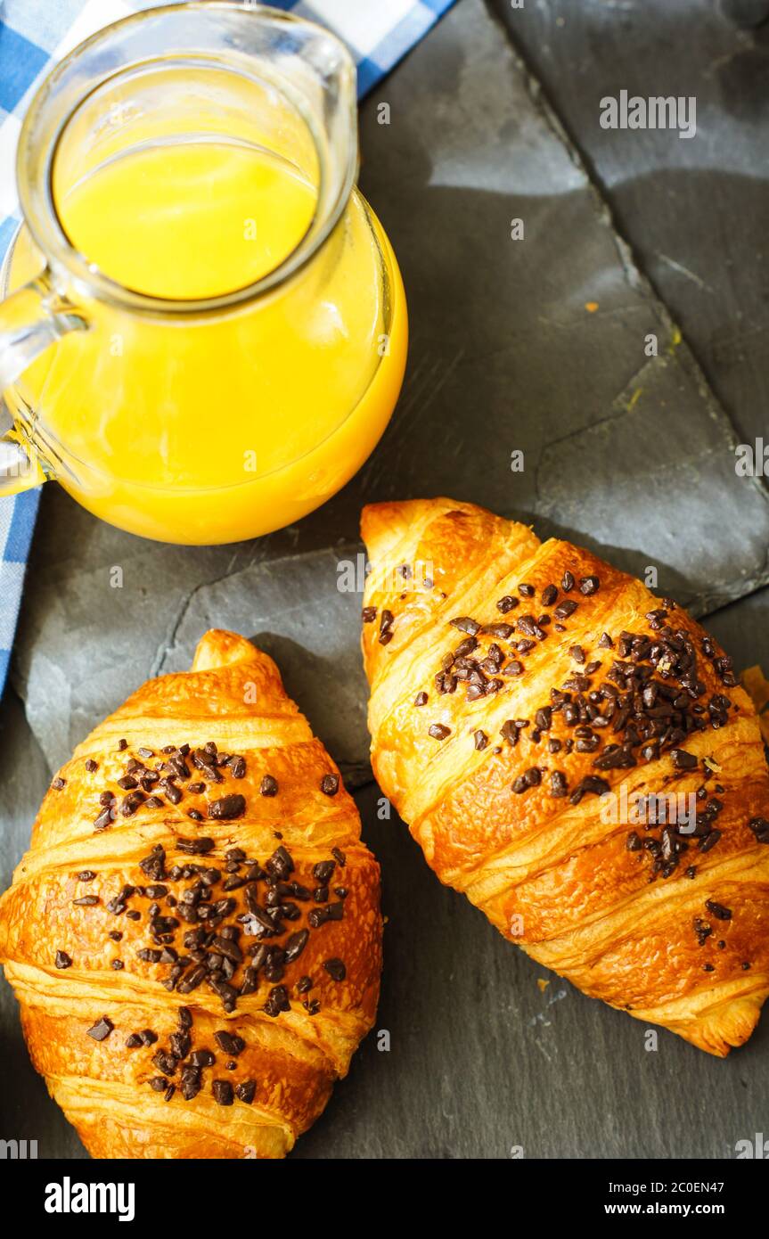 Traditional breakfast with croissant Stock Photo - Alamy