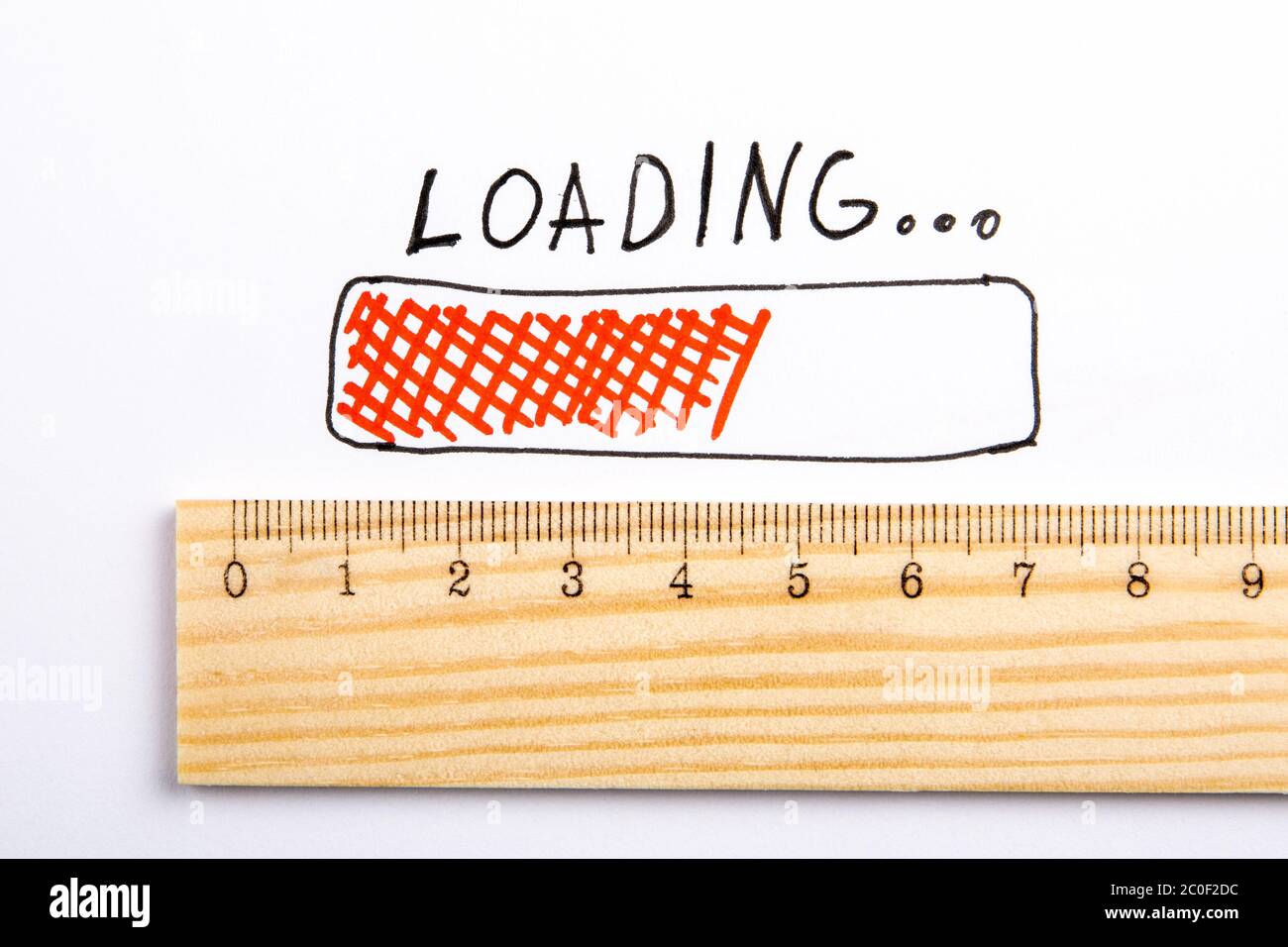 LOADING. Development, technology, software and apps concept. Wooden ...