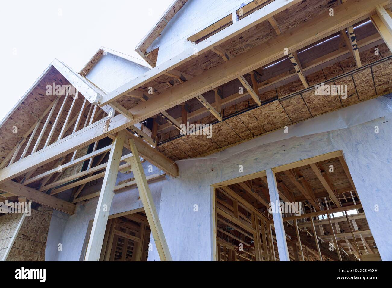 Roof structure of home framing a single family under construction Stock ...