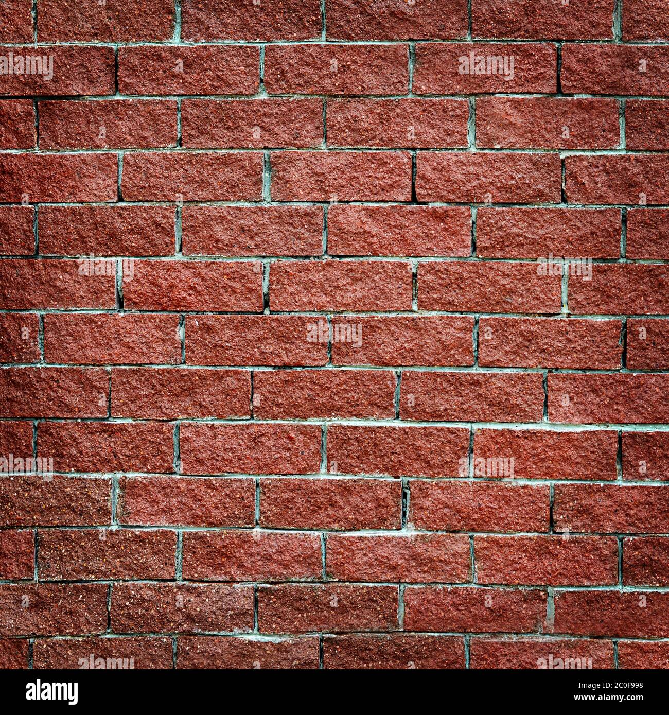 Wall from red brick close up Stock Photo - Alamy