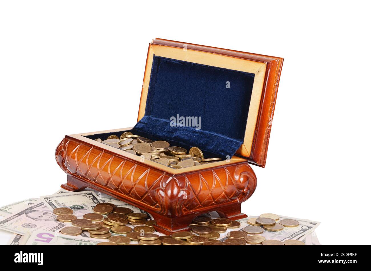Coins and banknotes in the box Stock Photo - Alamy