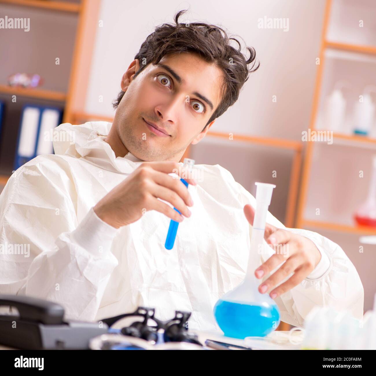 The young biochemist working in the lab Stock Photo - Alamy