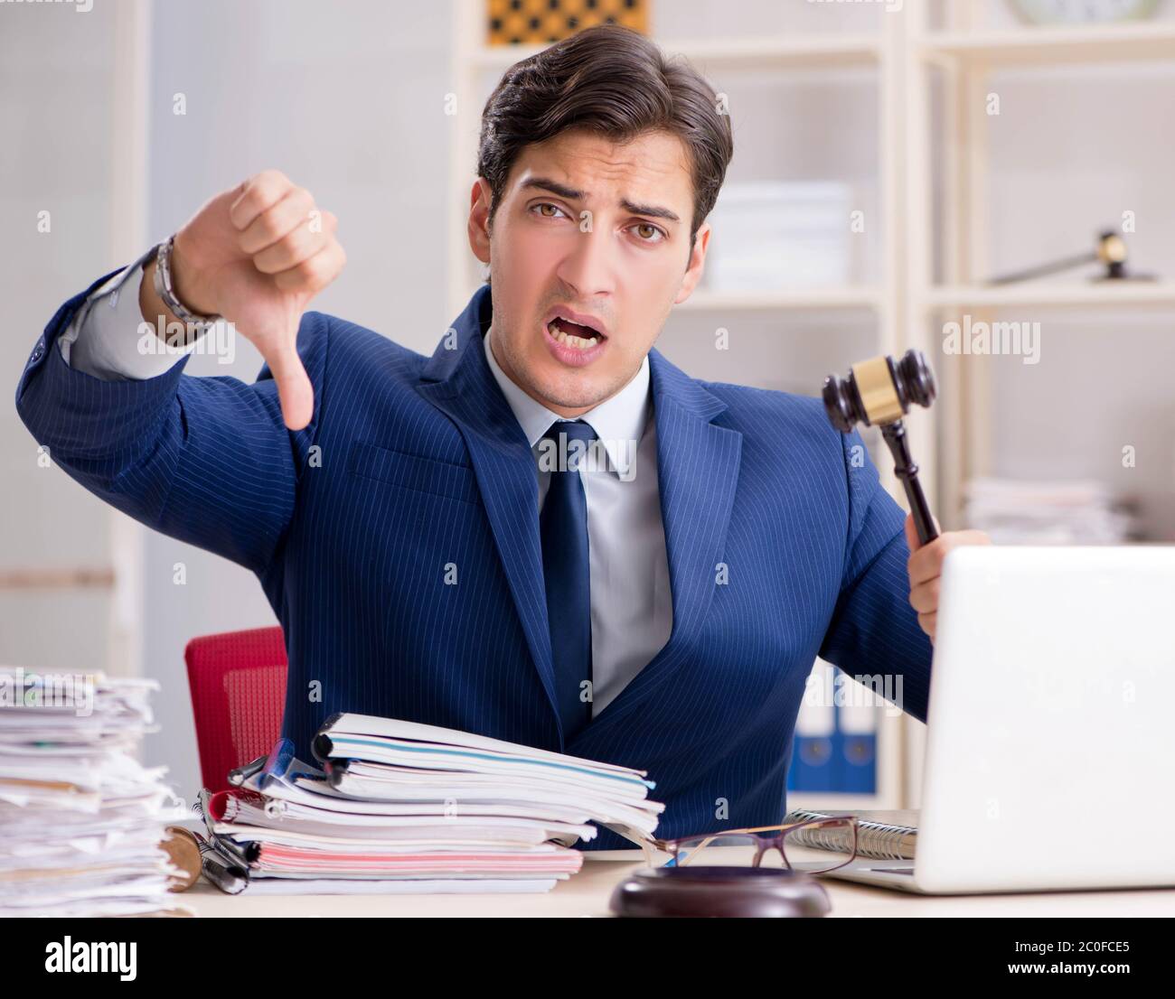 The young handsome judge working in court Stock Photo - Alamy