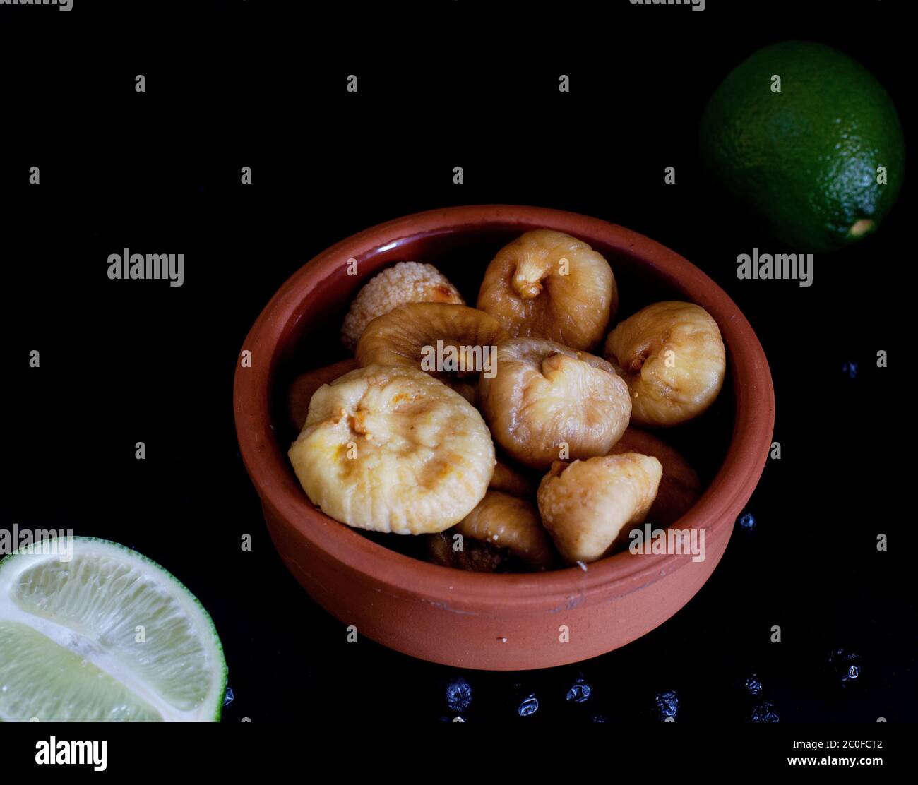 dried figs and limes Stock Photo - Alamy