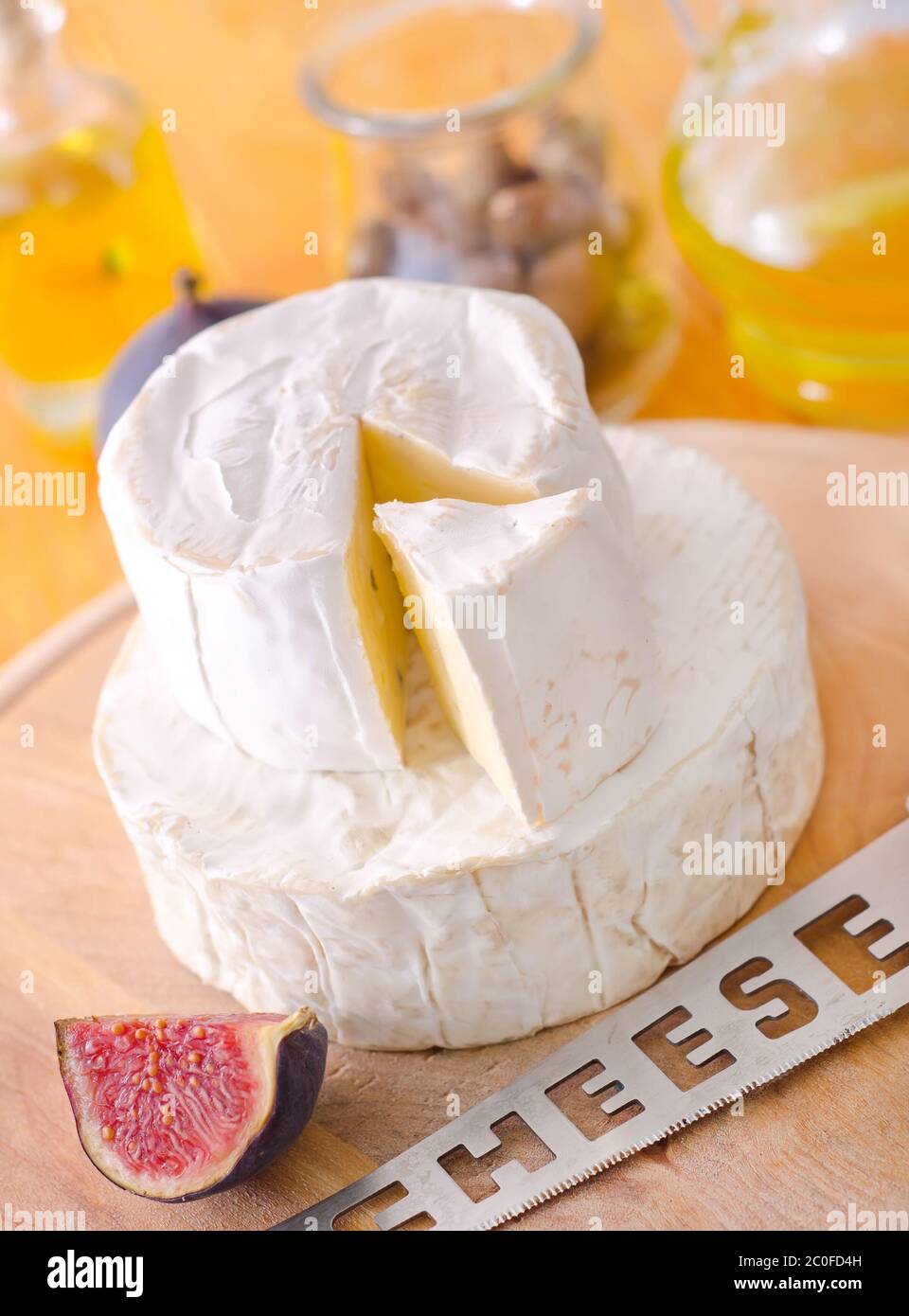 White mould full fat soft cheese hi-res stock photography and images ...