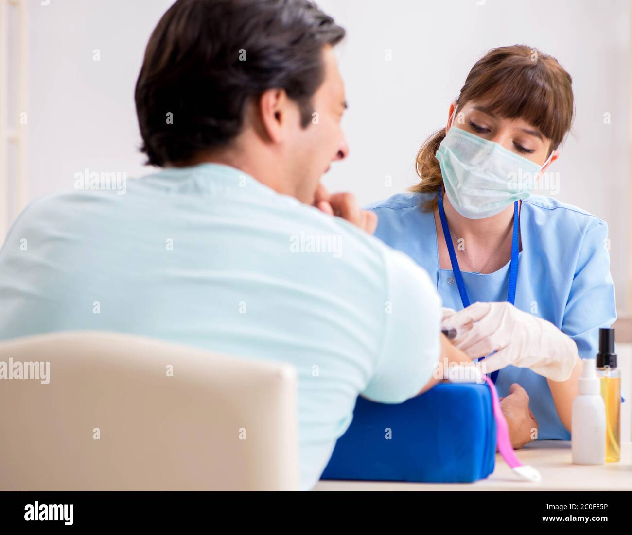The young patient during blood test sampling procedure Stock Photo - Alamy