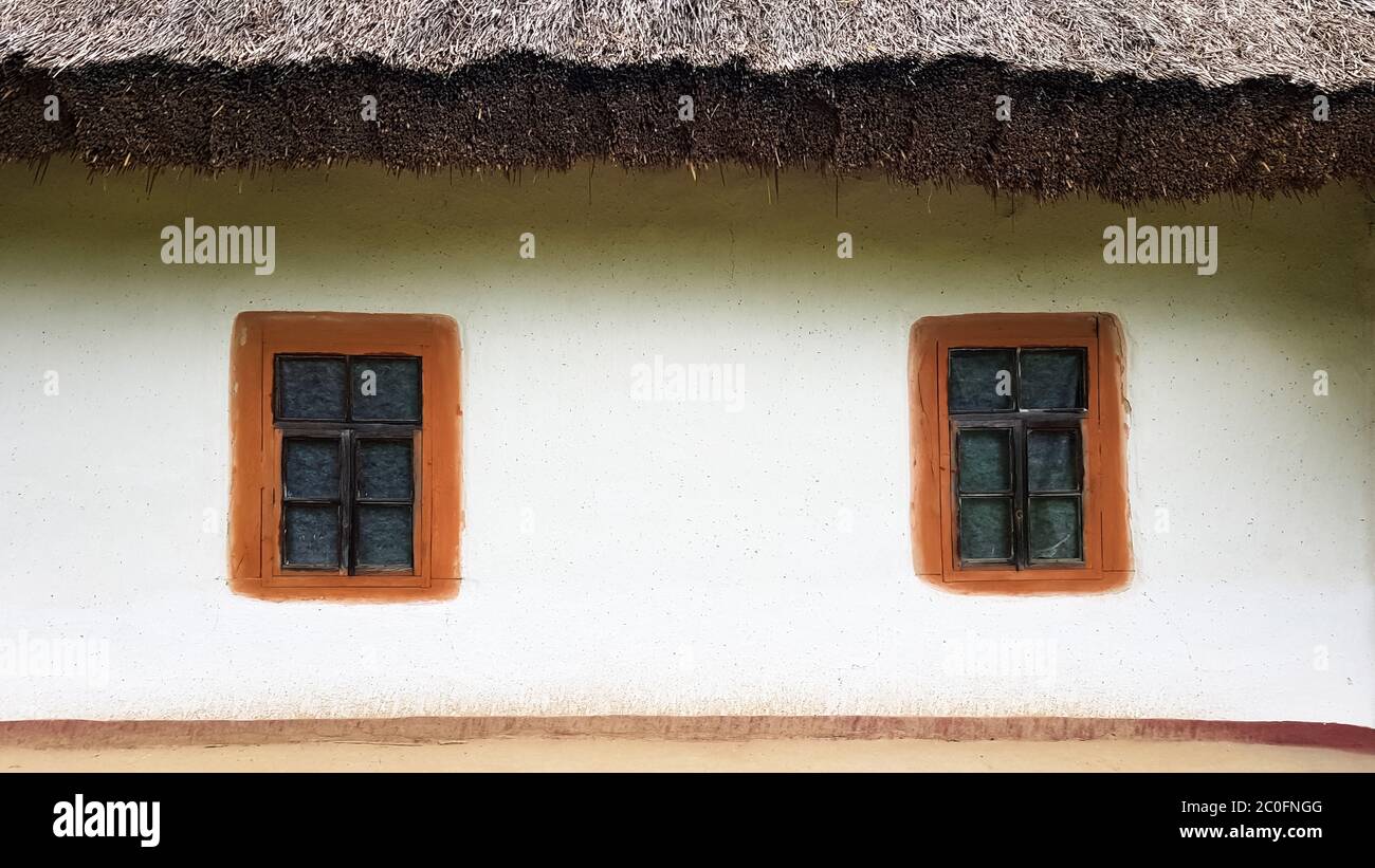 Old window in a vintage traditional peasant house in Ukraine. Antique ...