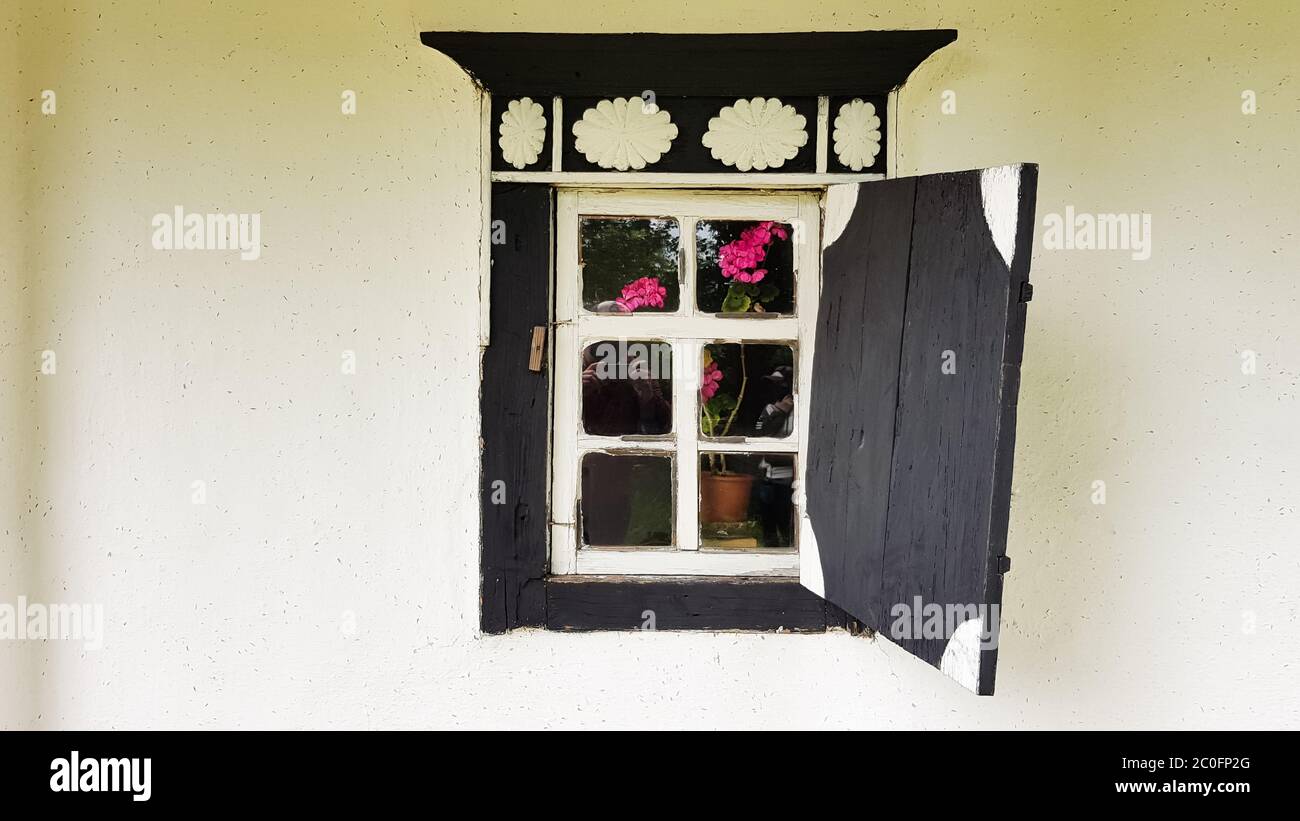 Old window in a vintage traditional peasant house in Ukraine. Antique ...