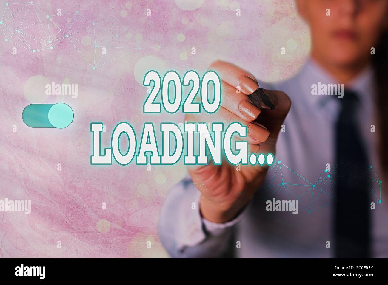 Writing note showing 2020 Loading.... Business concept for a year ...