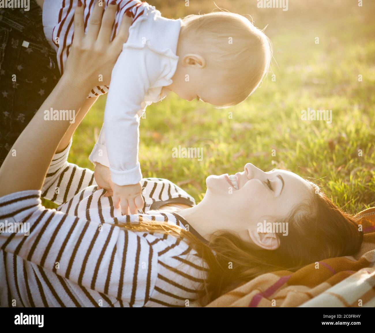 Happy young mother daughter play hi-res stock photography and images ...