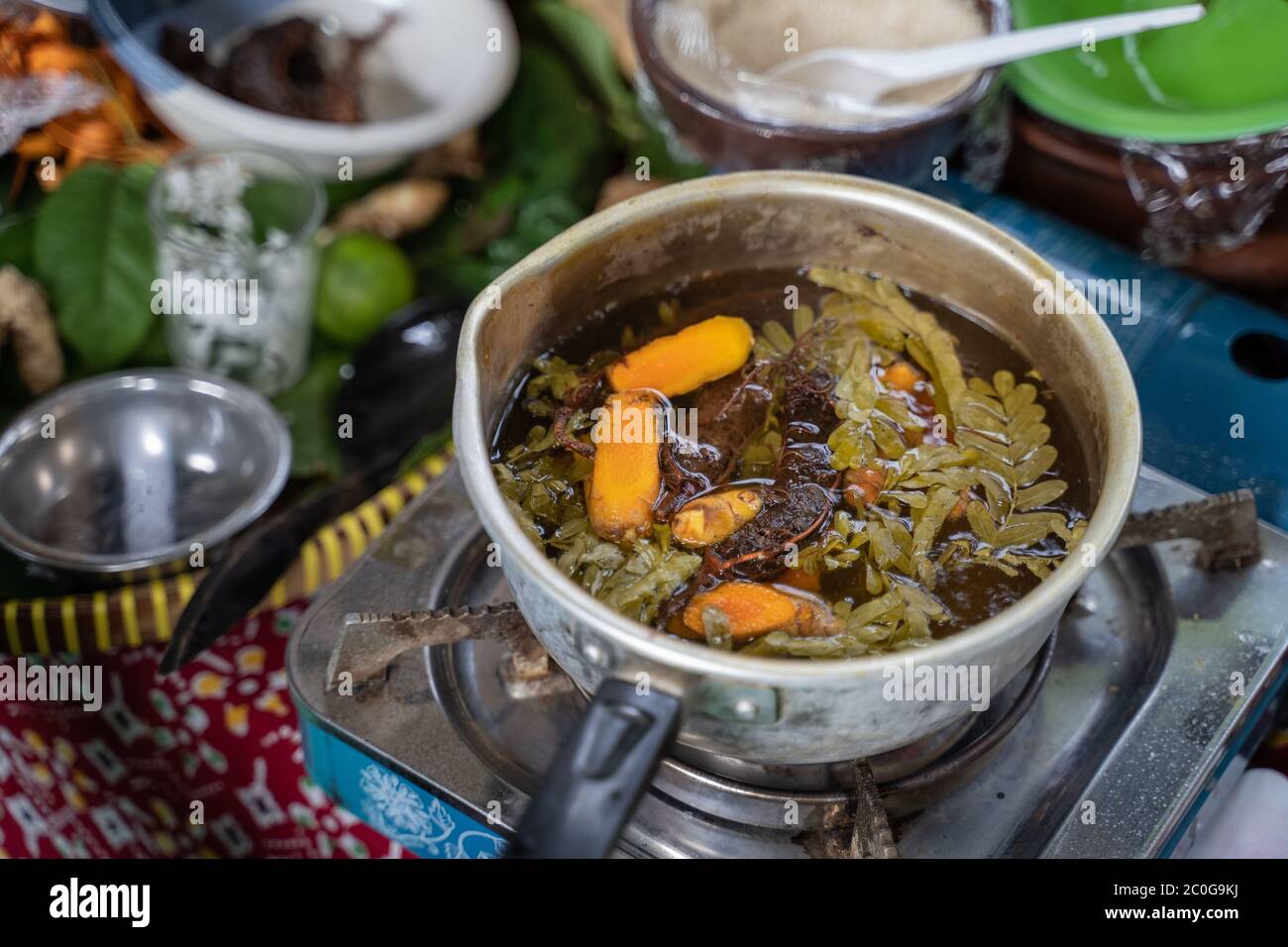 raw material for traditional herbal medicine with boiled turmeric ...