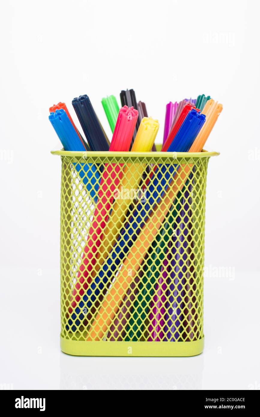 Drawing supplies concept. Photo of colorful markers in yellow pencil ...