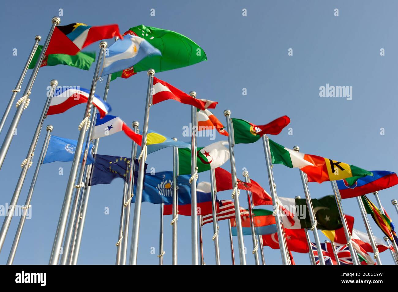 Different countries flags united together against blue sky Stock Photo ...