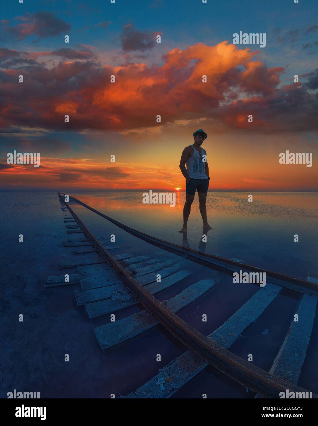 Male on beauty sunset on salty lake in Altay, Siberia, Russia Stock ...