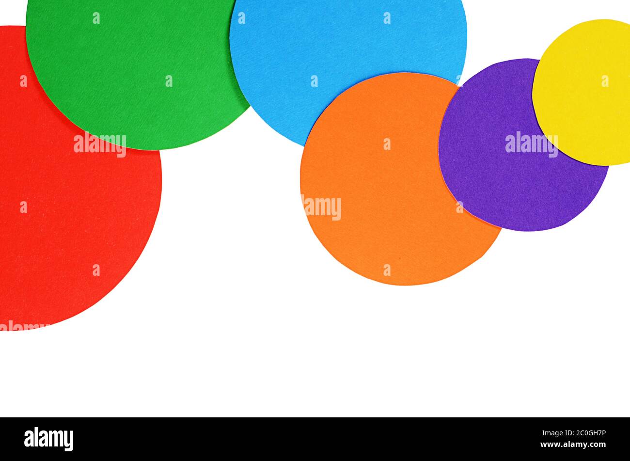 Circles color paper isolated on white Stock Photo - Alamy