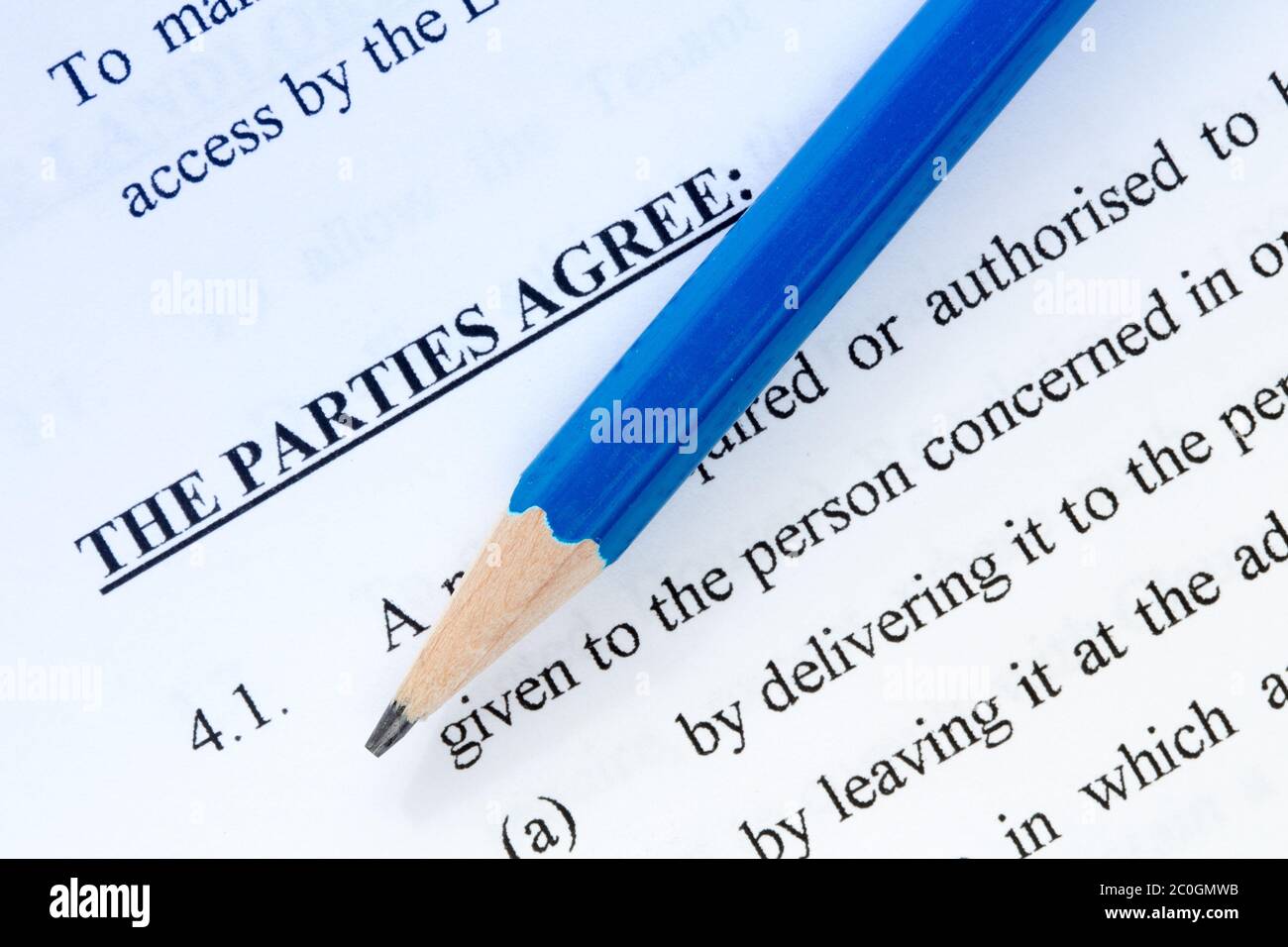 Pencil and agreement Stock Photo - Alamy