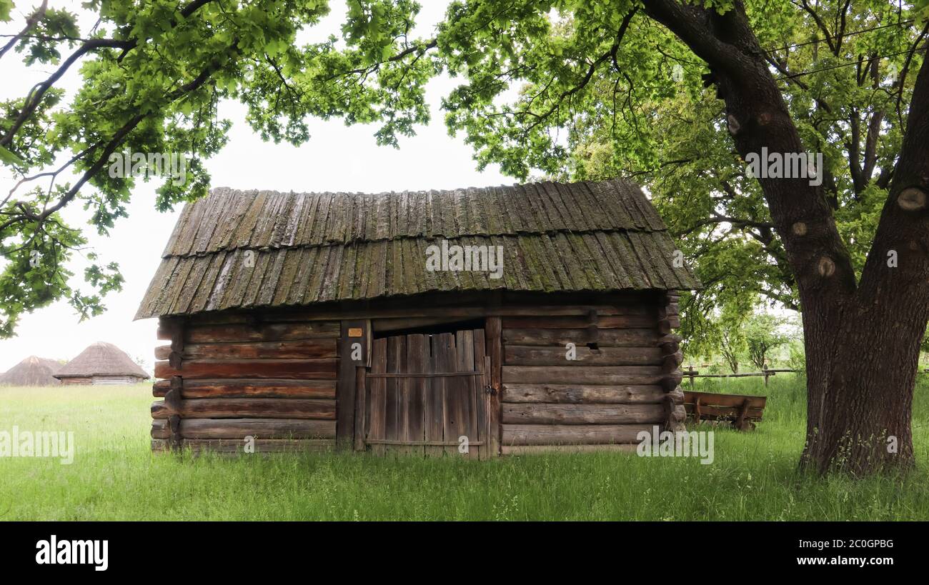 Ukraine, Kiev - June 11, 2020. Old peasant Ukrainian house or barn in ...
