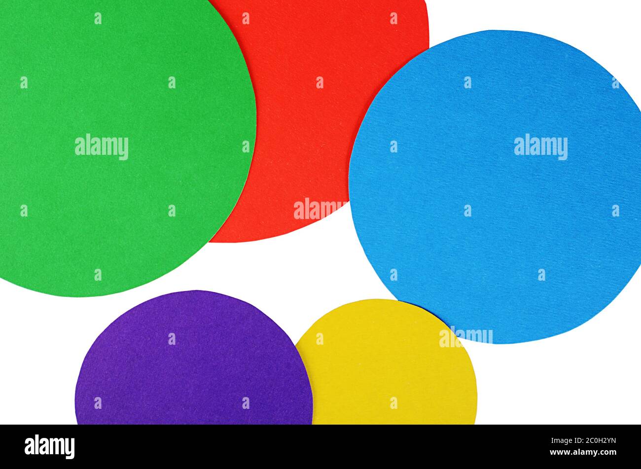 Circles color paper isolated on white Stock Photo - Alamy