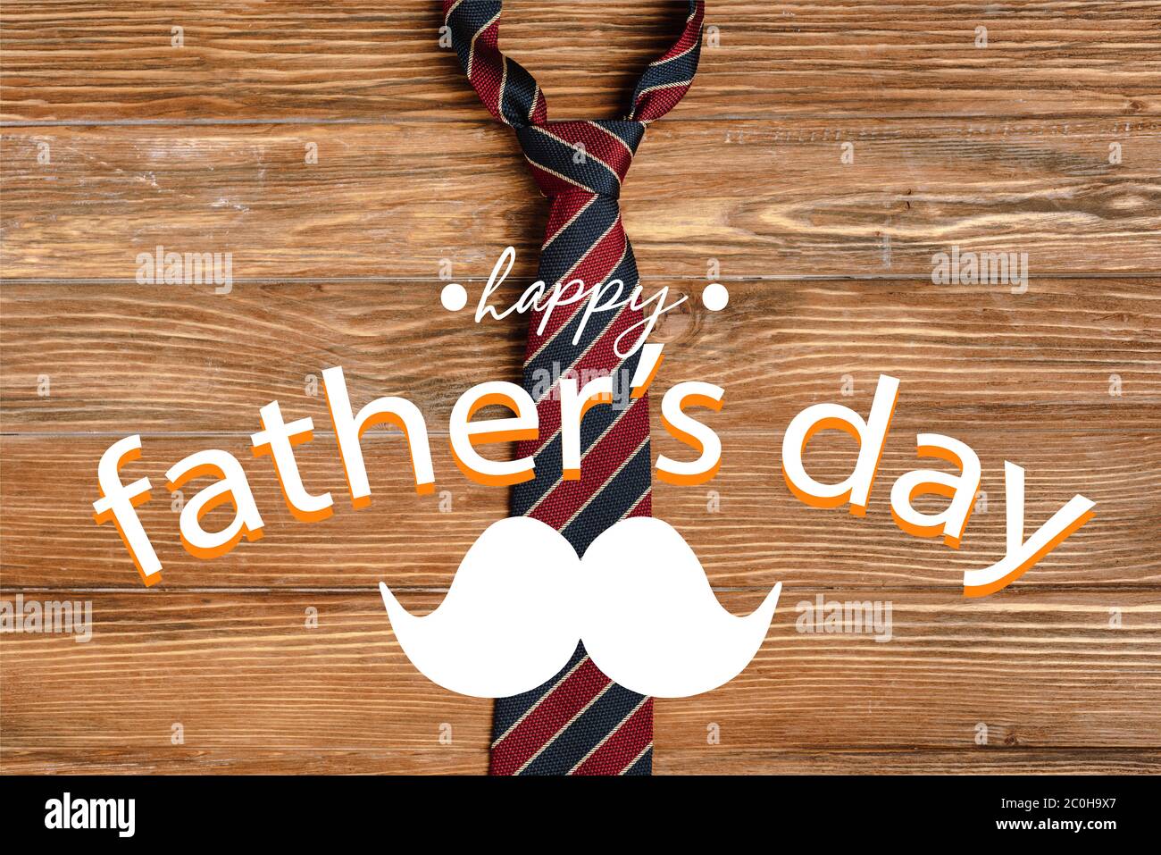 Top view of mens striped fabric tie on wooden background, happy fathers ...